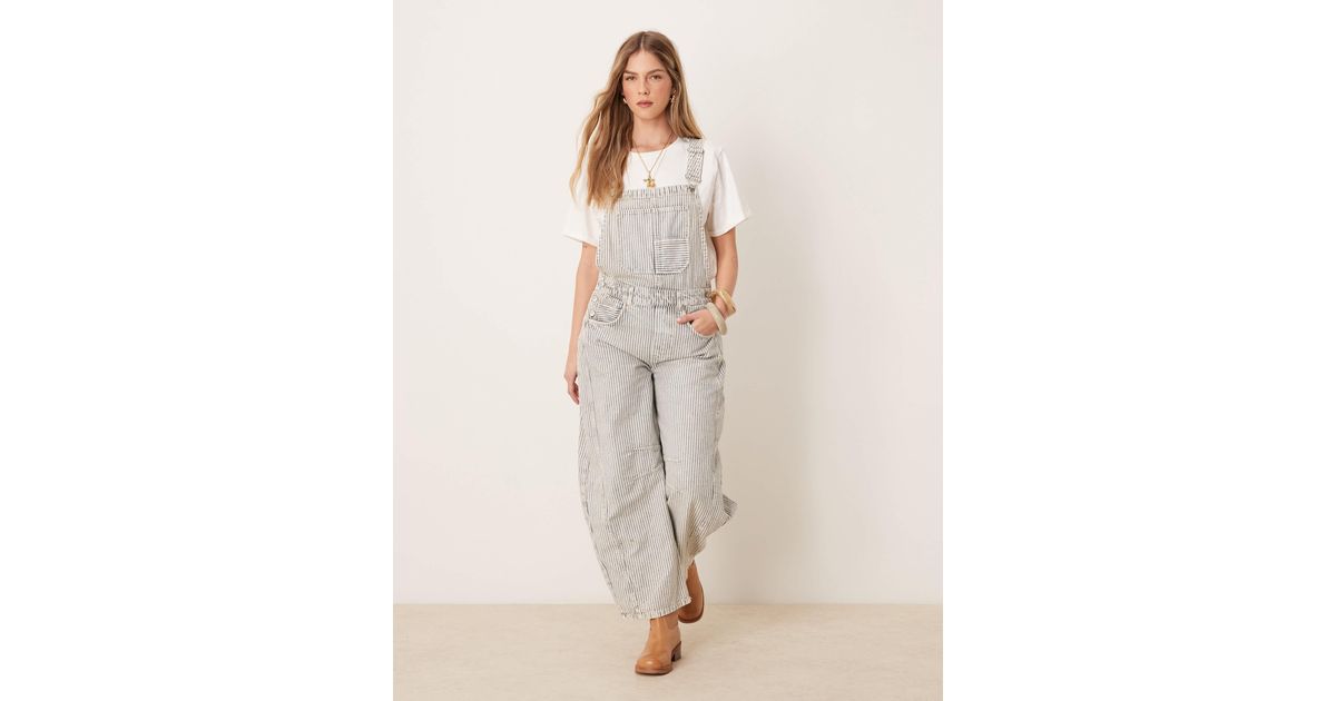 Free People Good Luck Striped Denim Overalls in Natural | Lyst