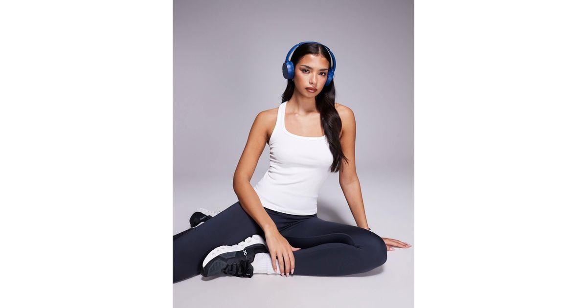 4505 Seamless Rib Scoop Neck Racer Back Active Vest in White | Lyst