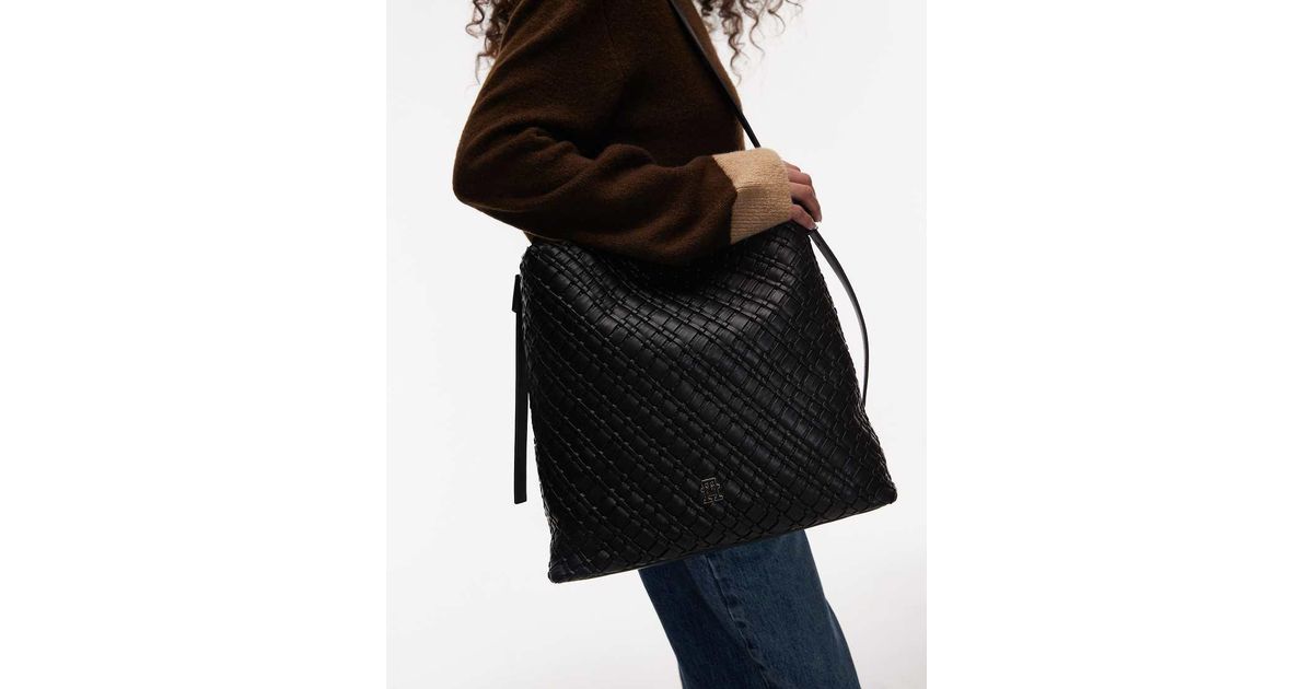 Tommy Hilfiger Braided Bucket Bag With Adjustable Strap in Black | Lyst UK