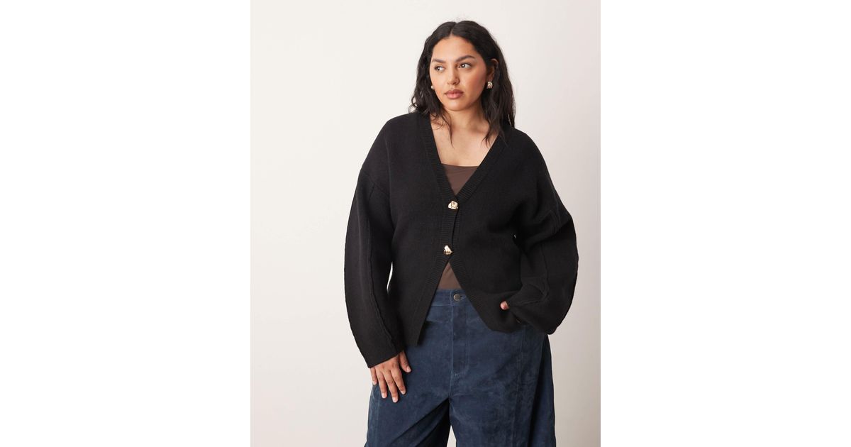 ARRANGE Curve Sculpted Waist Cardigan With Ovoid Sleeve in Black | Lyst