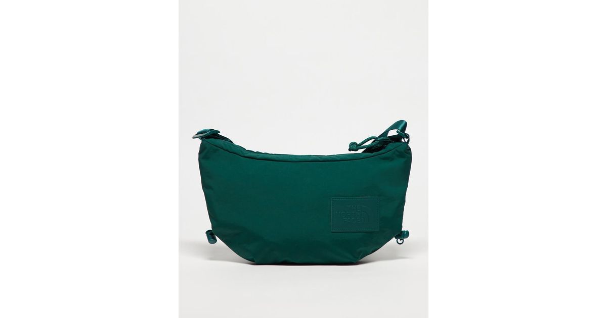 The North Face Never Stop Logo Crossbody Bag in Green | Lyst UK