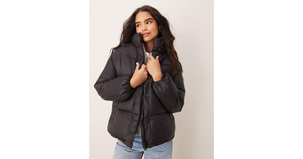 Mango Funnel Collar Puffer Coat in Black | Lyst