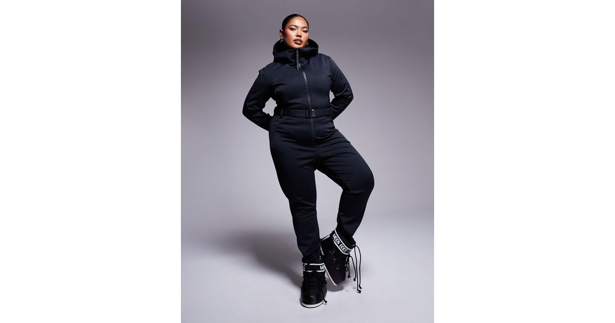 ASOS Curve Belted Ski Suit With Skinny Leg And Hood in Blue | Lyst