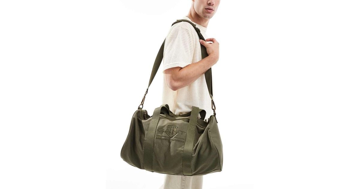GANT Tonal Shield Logo Duffle Bag in Green for Men | Lyst UK