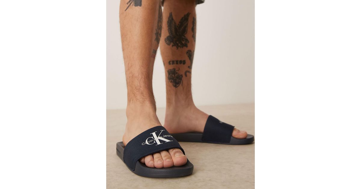 Calvin Klein Large Logo Sliders in Black for Men | Lyst