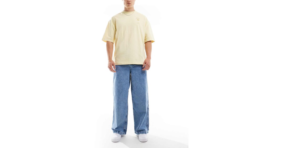 ASOS Super baggy Jeans With Ads Logo in Blue for Men | Lyst