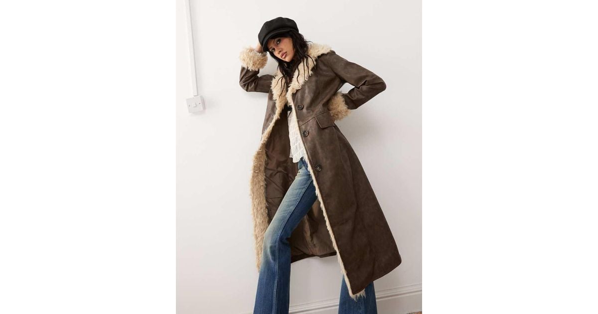 Reclaimed (vintage) Longline Leather Look Coat With Faux Fur Trims in Brown | Lyst UK