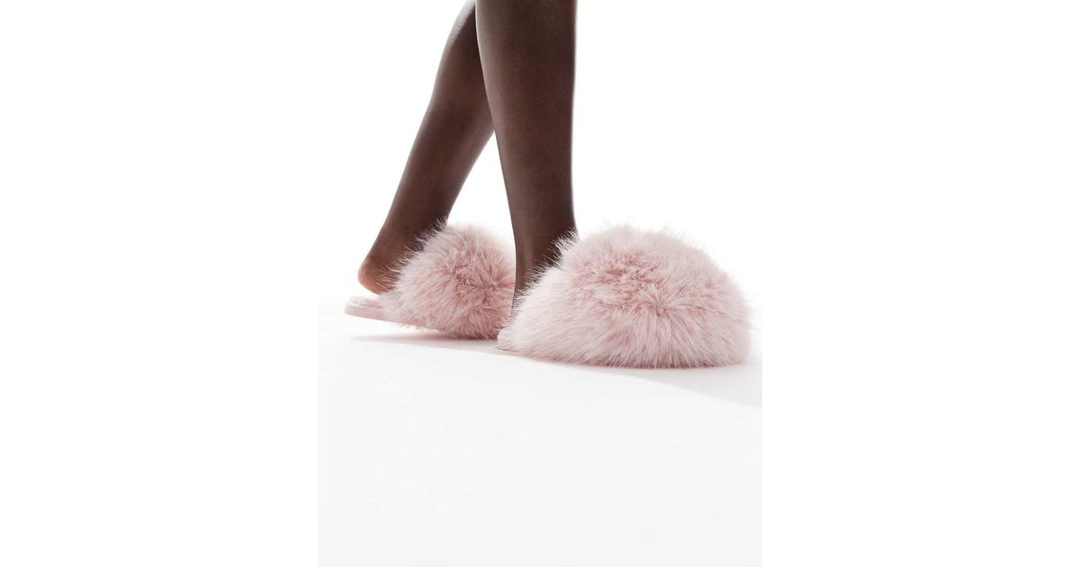 SEQWL Smarties Fluffy Pom Pom Slippers in Pink | Lyst UK