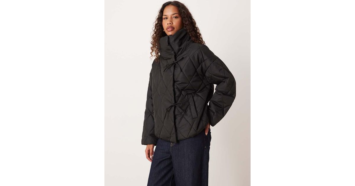 Vila High Neck Quilted Jacket With Tie Details in Black | Lyst UK