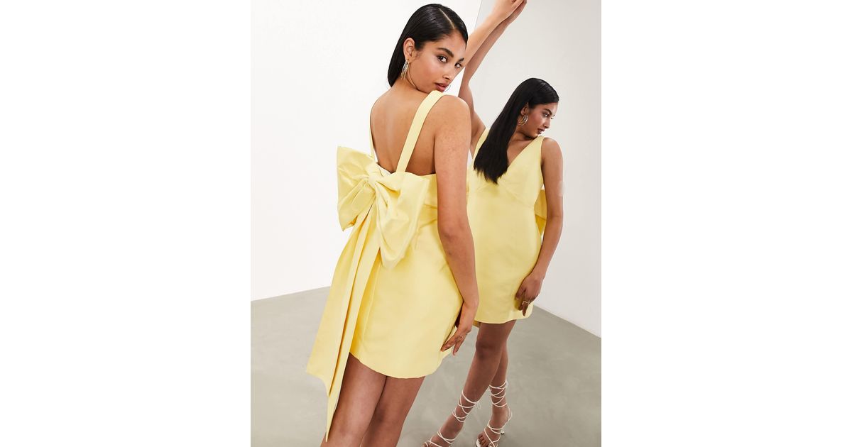 ASOS Structured Mini Dress With Statement Bow Back Detail in Yellow | Lyst