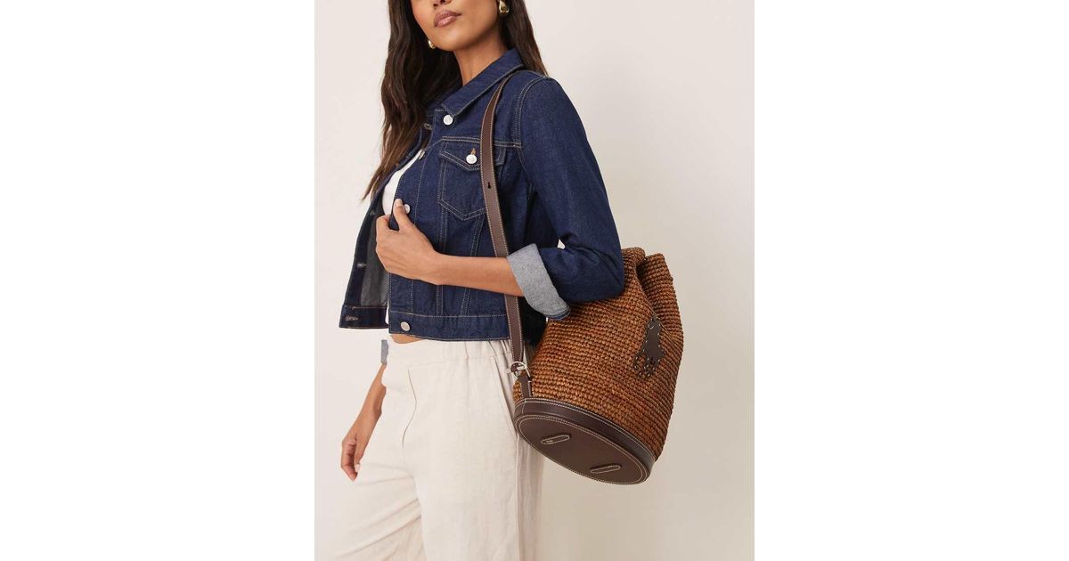 Polo Ralph Lauren Bucket Tas Van Raffia Met Logo in het Blauw | Lyst NL