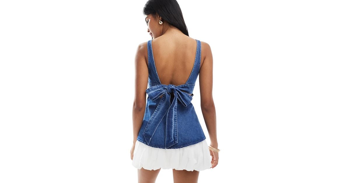 ASOS Denim Peplum Top With Bow Back Detail in Blue | Lyst