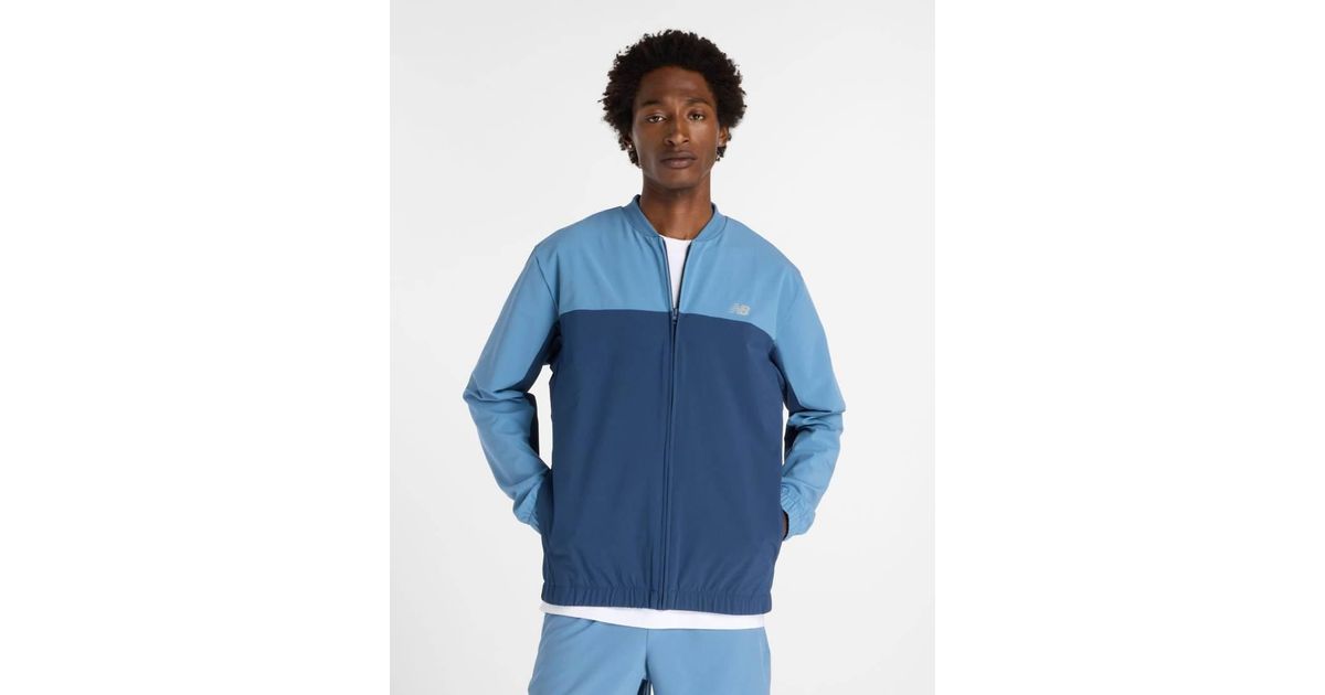 New Balance Stretch Bomber Jacket in Blue for Men | Lyst UK