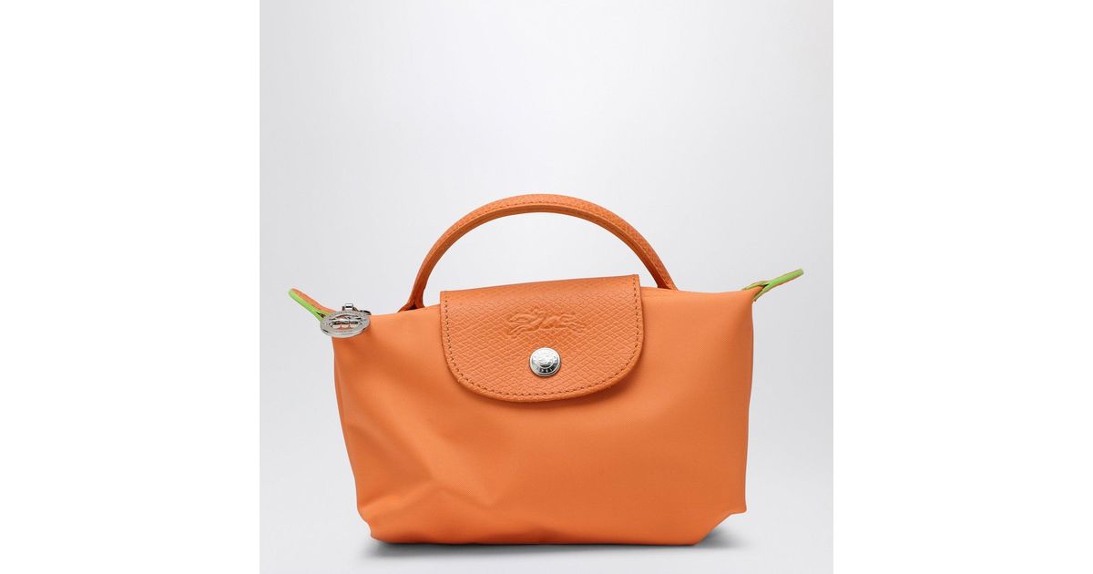 Longchamp Le Pliage Clutch Bag in Orange | Lyst