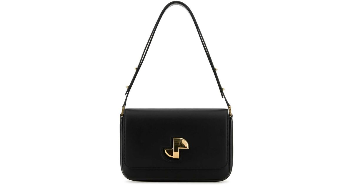 Patou Leather Le Classic Lock Shoulder Bag in Black for Men | Lyst