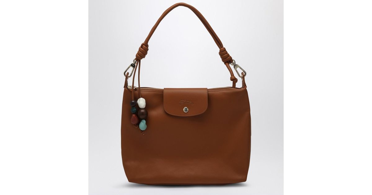 Mykita Cashew Coloured Le Pliage Xtra Hobo Bag in Brown | Lyst UK