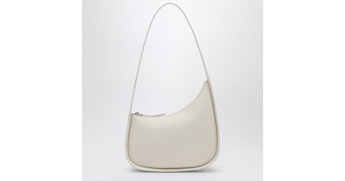 The Row Ivory Half Moon Bag in White | Lyst