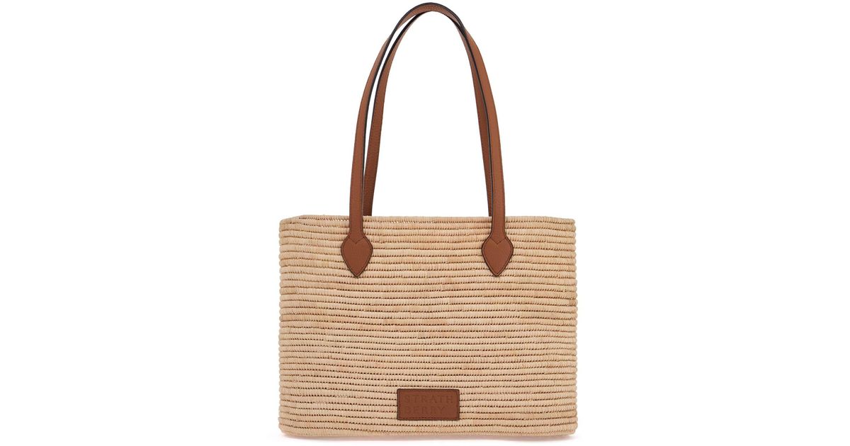 Sac à panier moyen en raffie naturel avec détails en cuir et fermeture ...