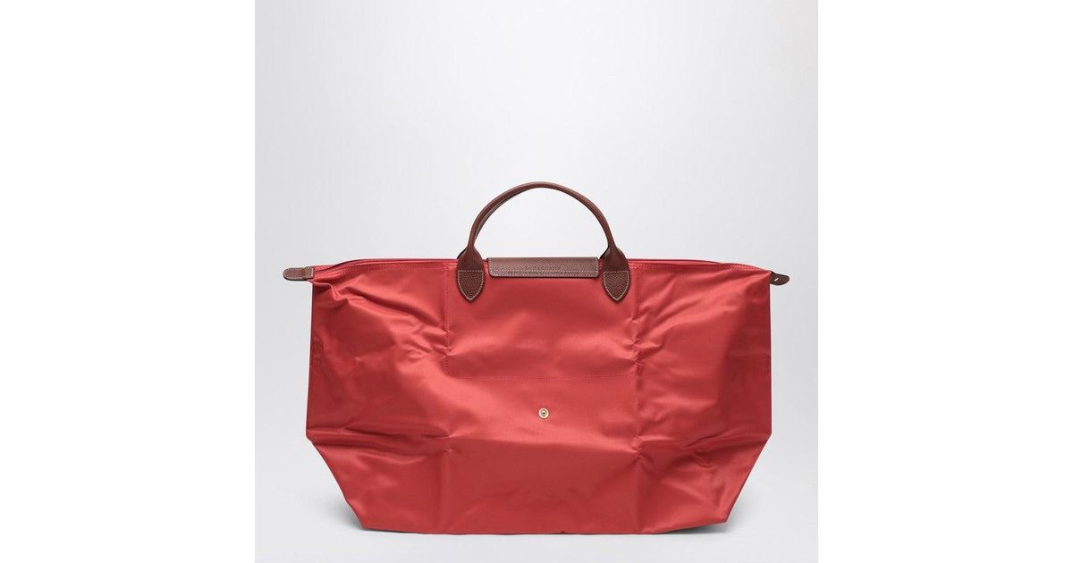 Longchamp Travel Bag Tomato Le Pliage Original S in Red | Lyst