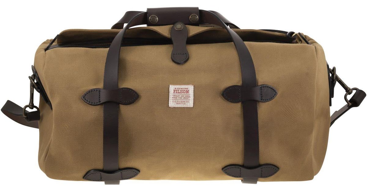 Filson Duffle Small Water Repellent Duffle Bag in Brown | Lyst