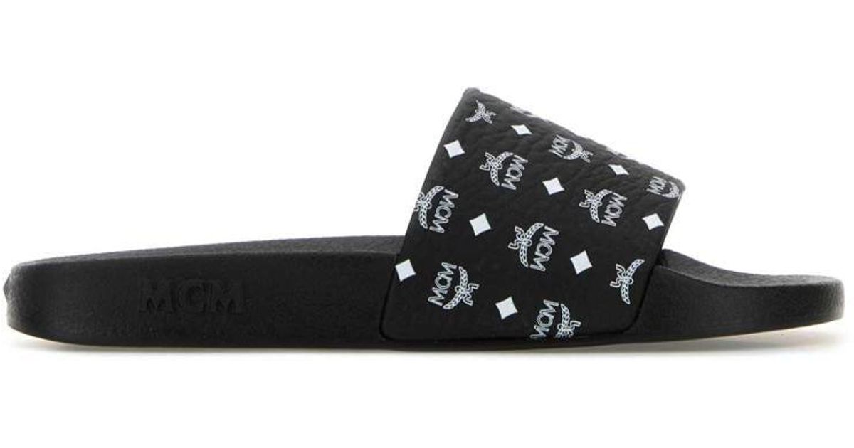 MCM Slippers in Black | Lyst