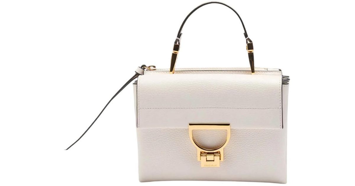 Coccinelle Bags in Natural | Lyst