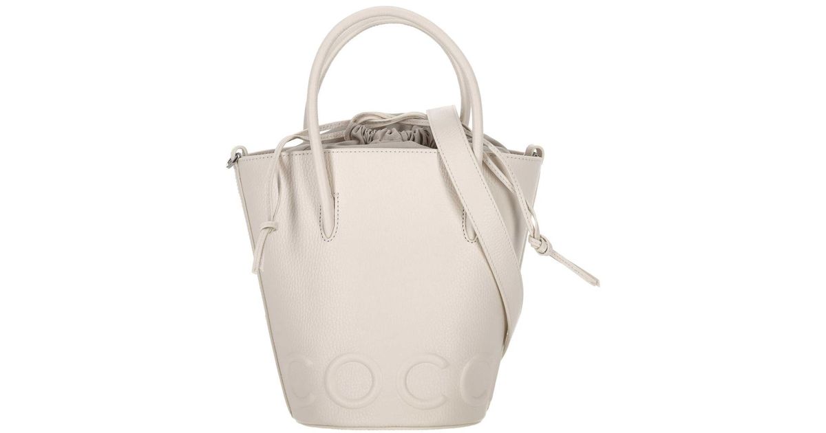 Coccinelle Bags in Natural | Lyst