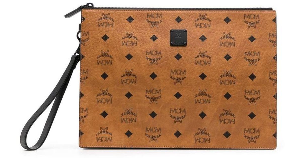 MCM Clutch in Brown for Men | Lyst
