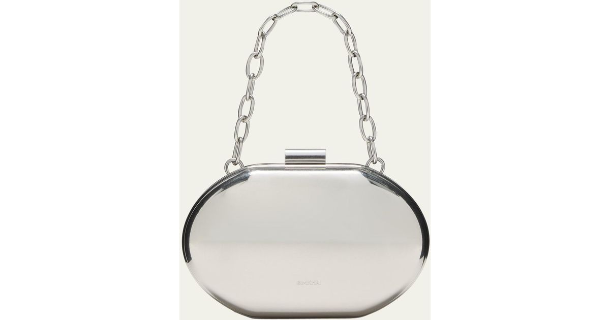 Jonathan Simkhai Sol Oval Metal Clutch Bag in Natural | Lyst