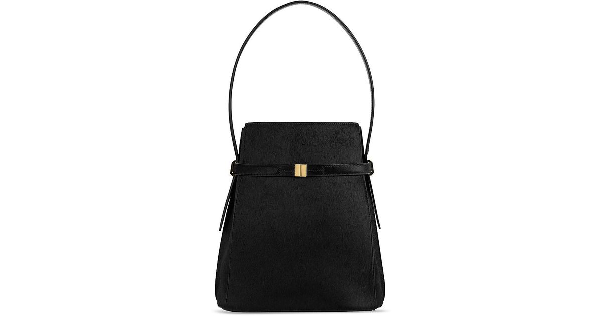TOTEME Belted Calf Hair Bucket Bag in Black | Lyst