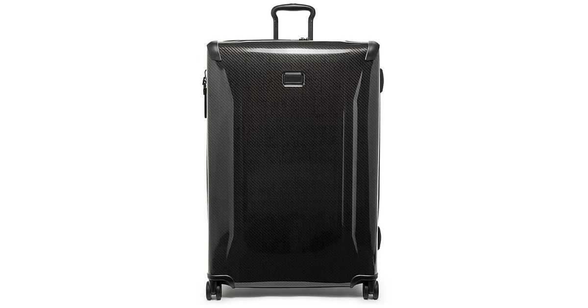 Tumi Tegra Lite Extended Trip Expandable Spinner Suitcase in Black | Lyst