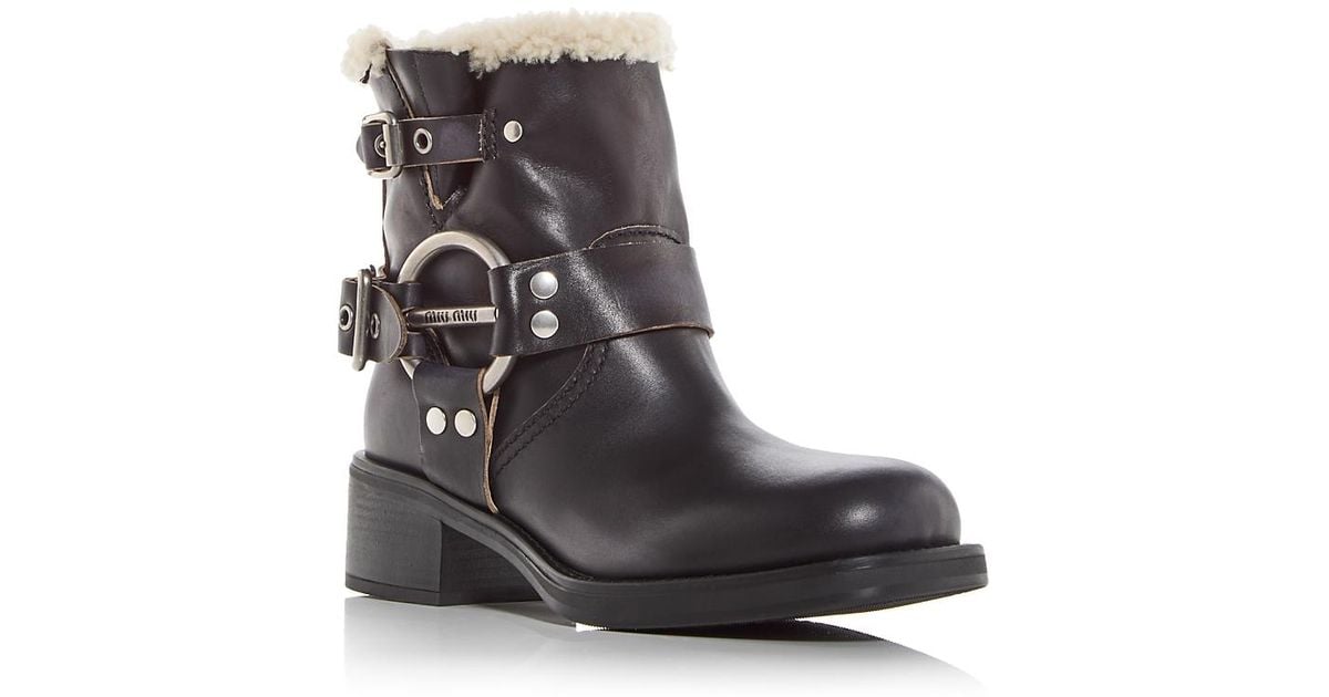 Miu Miu Shearling Trim Moto Booties in Black | Lyst