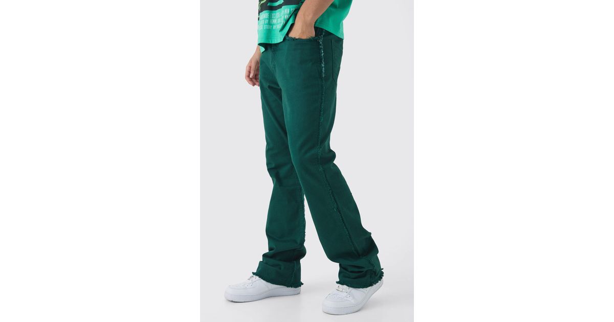 BoohooMAN Slim Rigid Flare Stacked Frayed Edge Denim Jeans in Green for ...