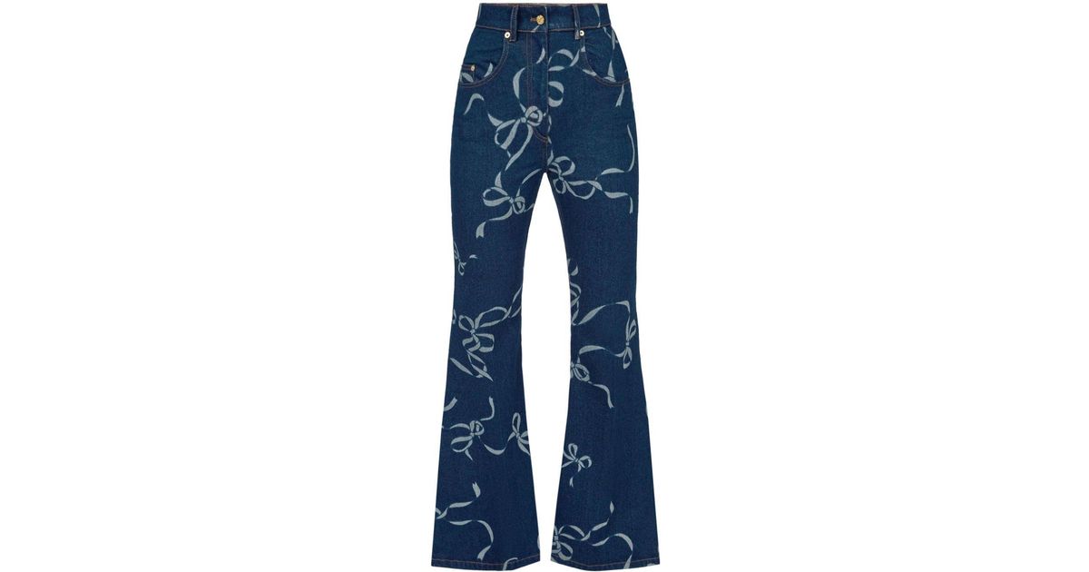 Nina Ricci Bow-Print Flared Jeans in Blue | Lyst