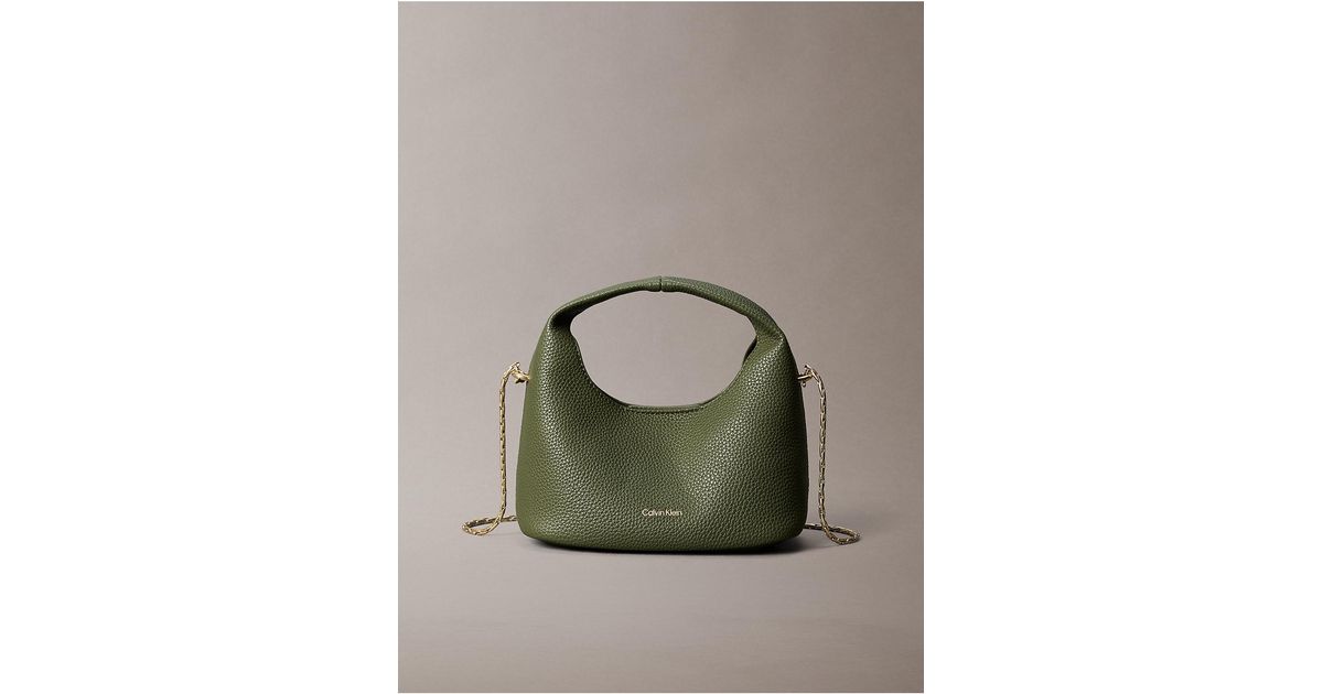 Calvin Klein Pebble Grain Small Slouchy Bag in Green | Lyst