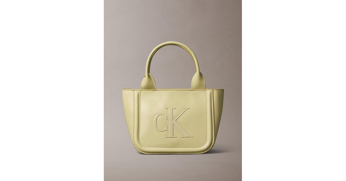 Calvin Klein Embossed Monogram Logo Small Tote Bag in Natural | Lyst UK