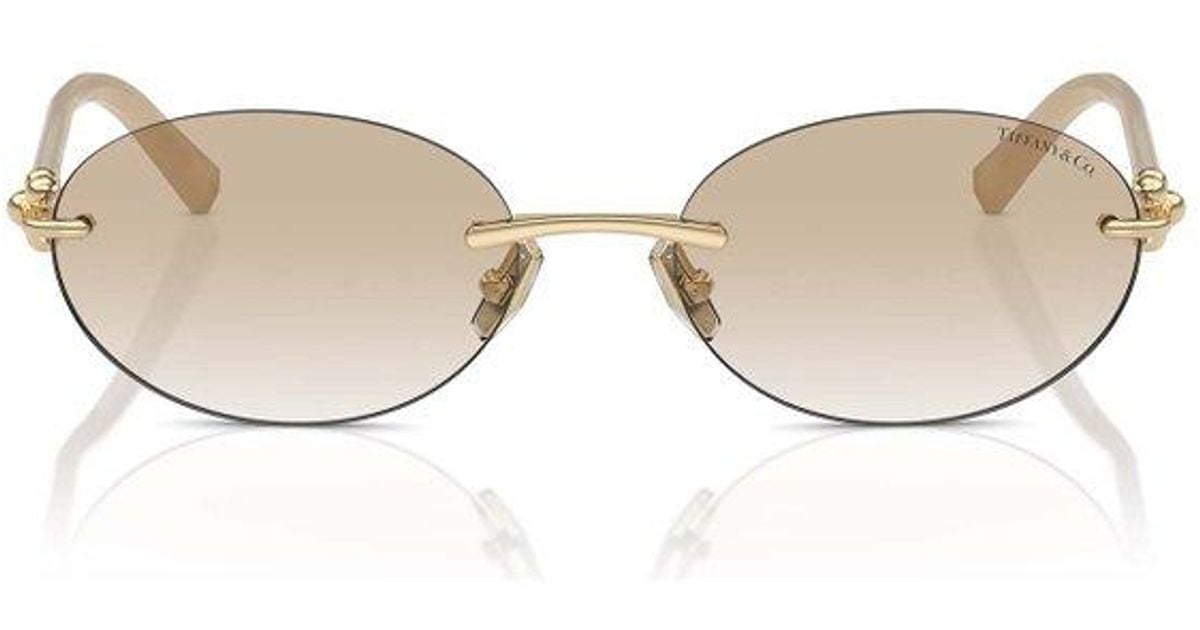 Tiffany & Co. Oval Frameless Sunglasses in Natural | Lyst