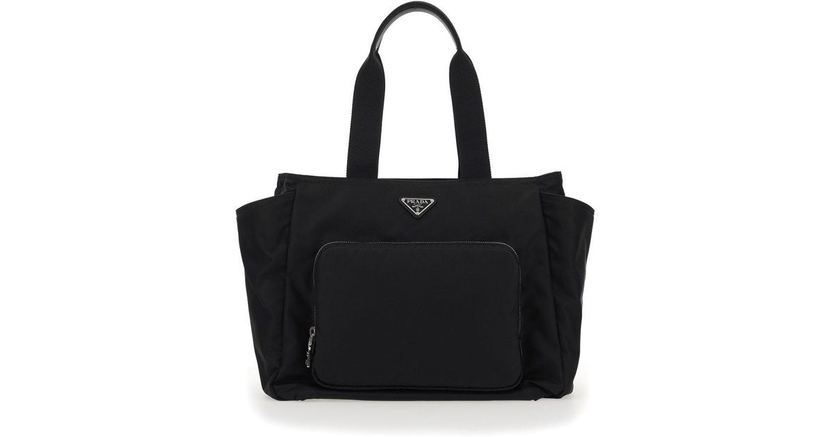 Prada Logo Plaque Changing Bag in Black | Lyst