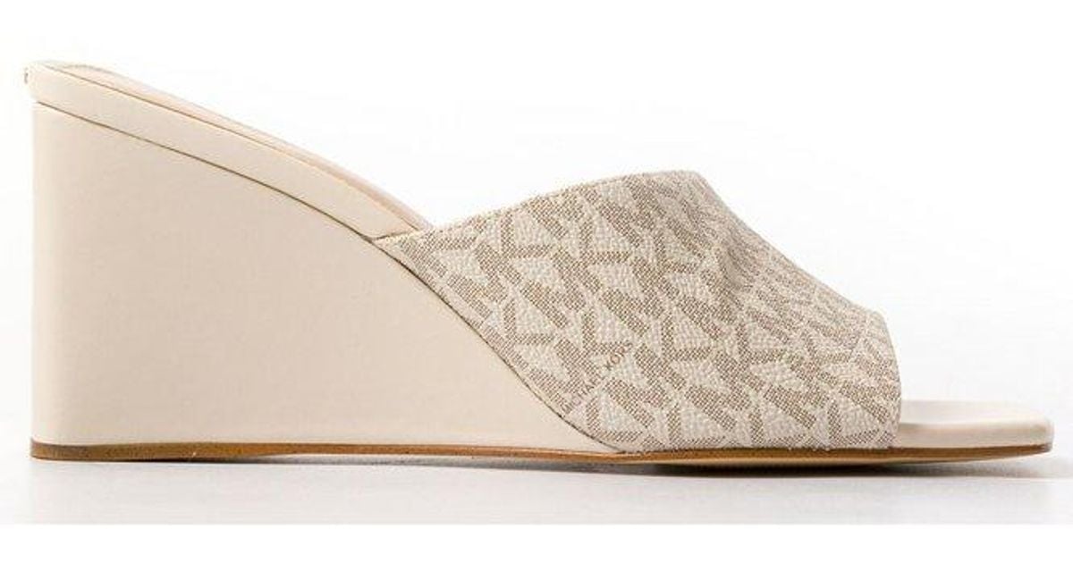 MICHAEL Michael Kors Merriam Signature Logo Wedge Sandals in Natural | Lyst