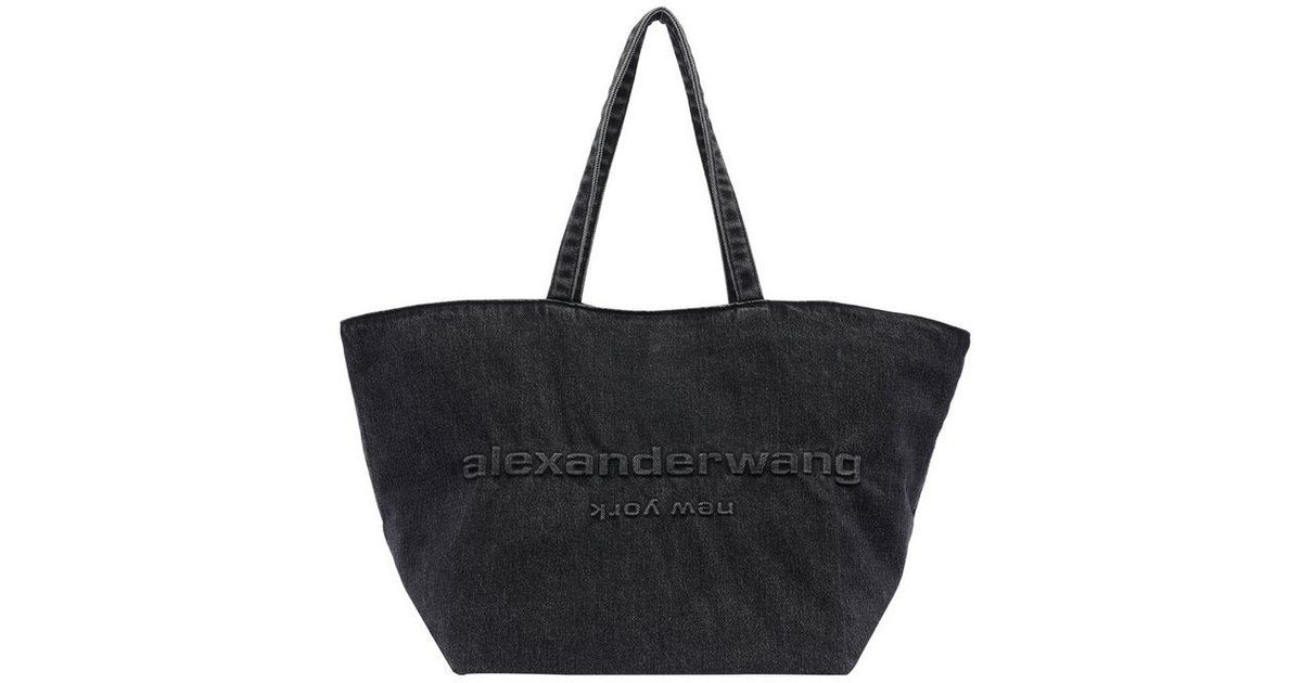 Alexander Wang Logo Embossed Large Denim Tote Bag in Black | Lyst