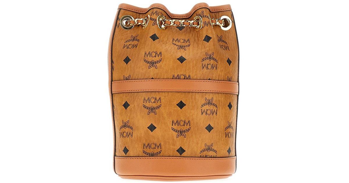 MCM Mini Aren Chain Drawstring Backpack in Orange | Lyst