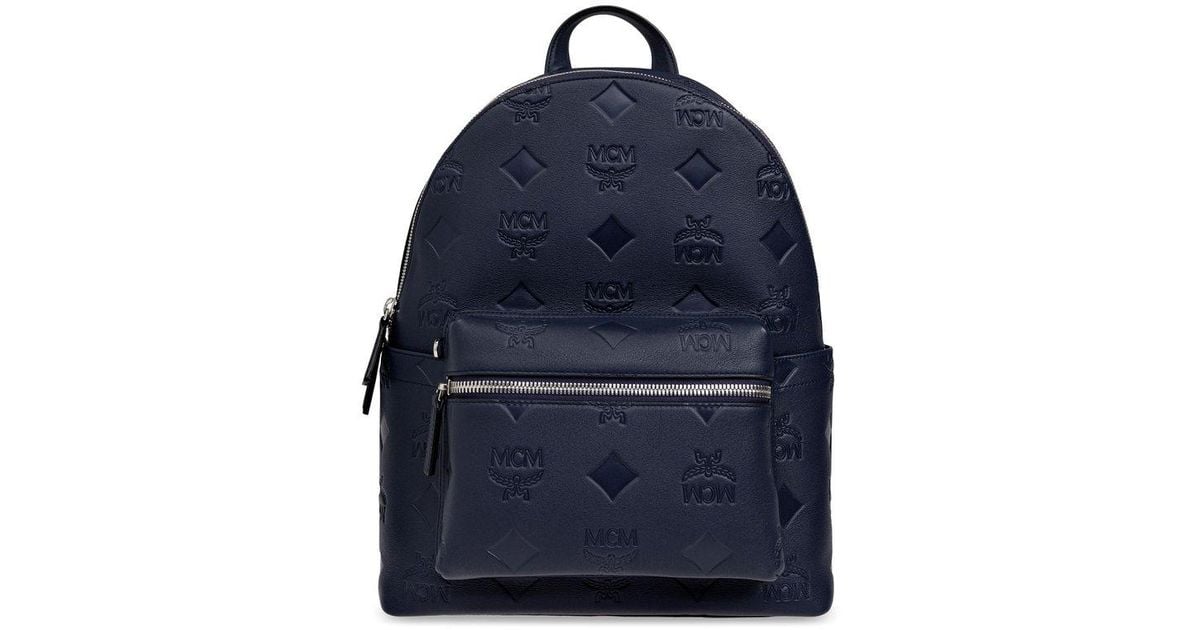 MCM Stark Logo Embossed Medium Backpack in Blue for Men | Lyst UK