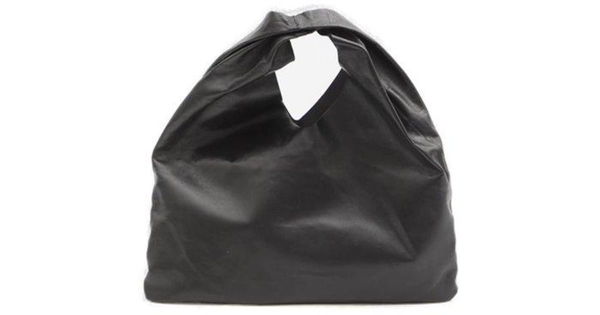 The Row Small Bindle Bag in Black | Lyst