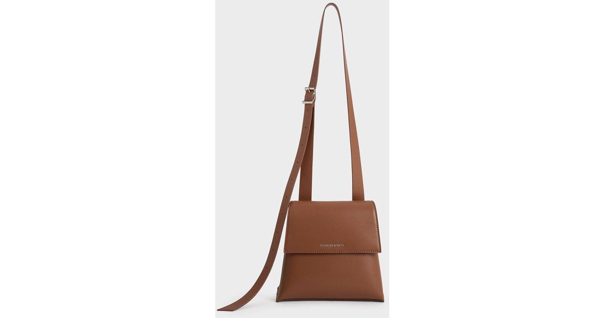 Charles & Keith Marceline Trapeze Crossbody Bag in Brown | Lyst