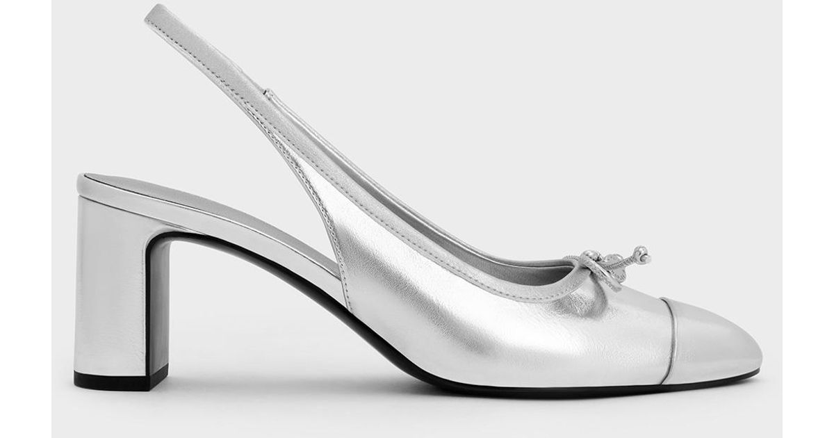 Charles & Keith Metallic Bow Cap-Toe Slingback Pumps in White | Lyst