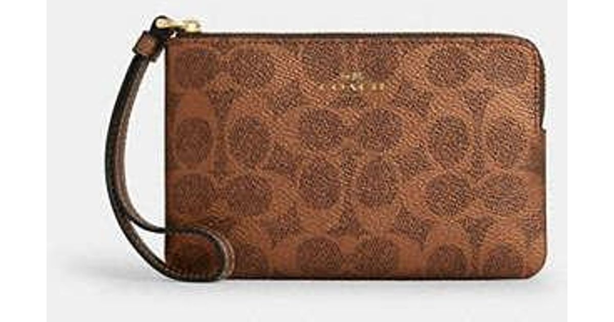COACH Corner Zip Wristlet in Black | Lyst