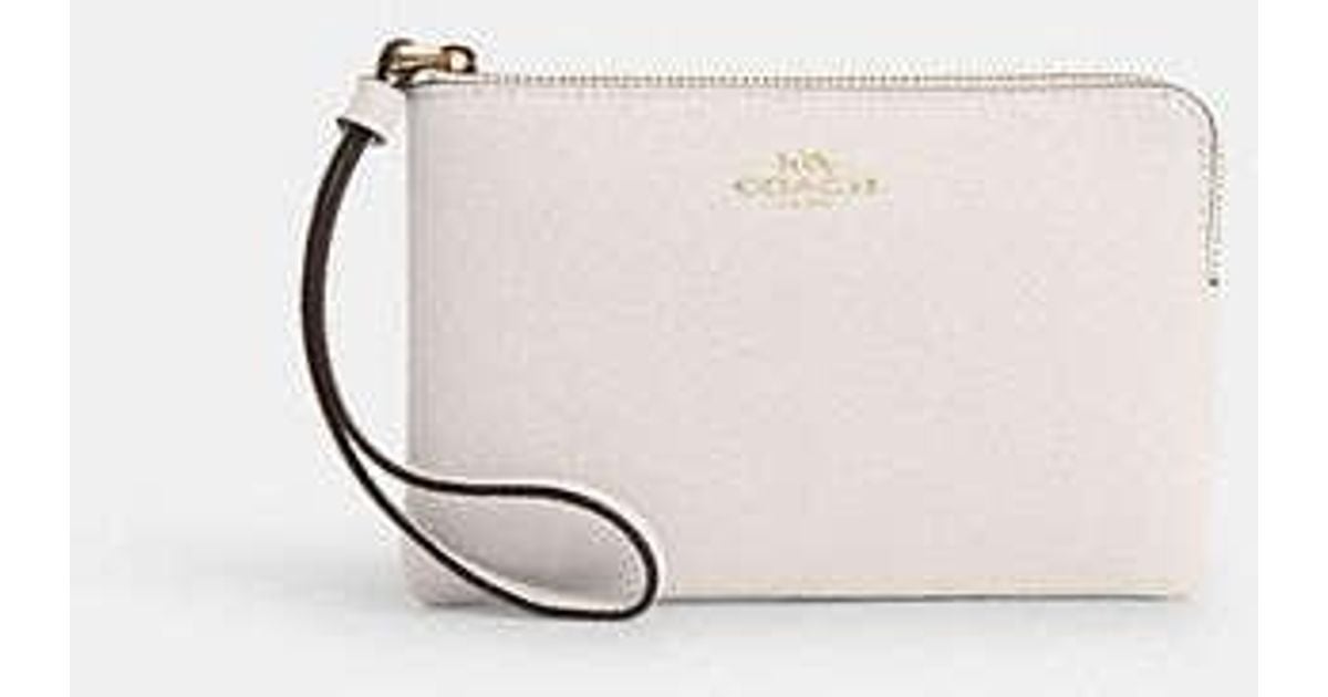 COACH Corner Zip Wristlet in Black | Lyst
