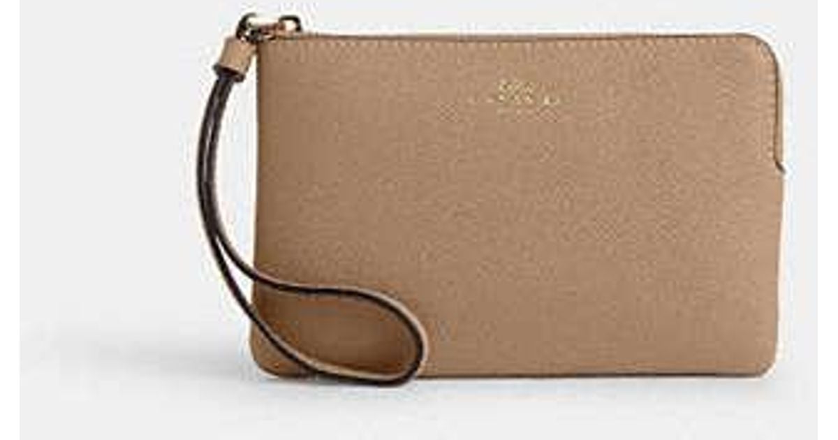 COACH Corner Zip Wristlet in Black | Lyst