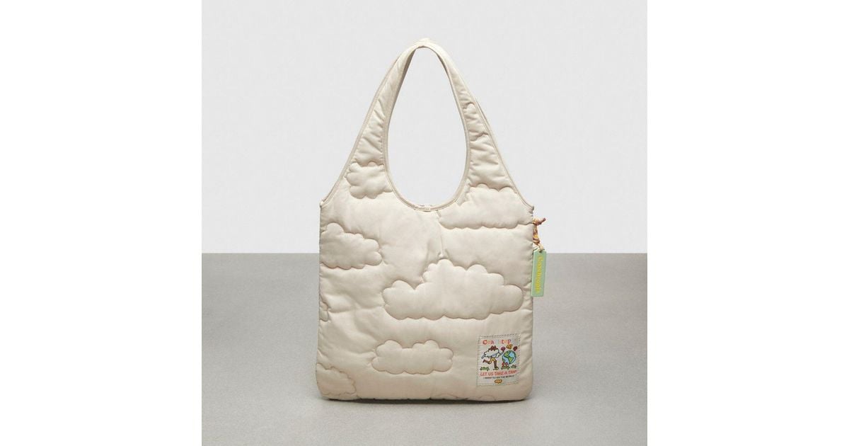 COACH Topia Loop Flat Tote With Plaid Cloud Quilting in Natural | Lyst