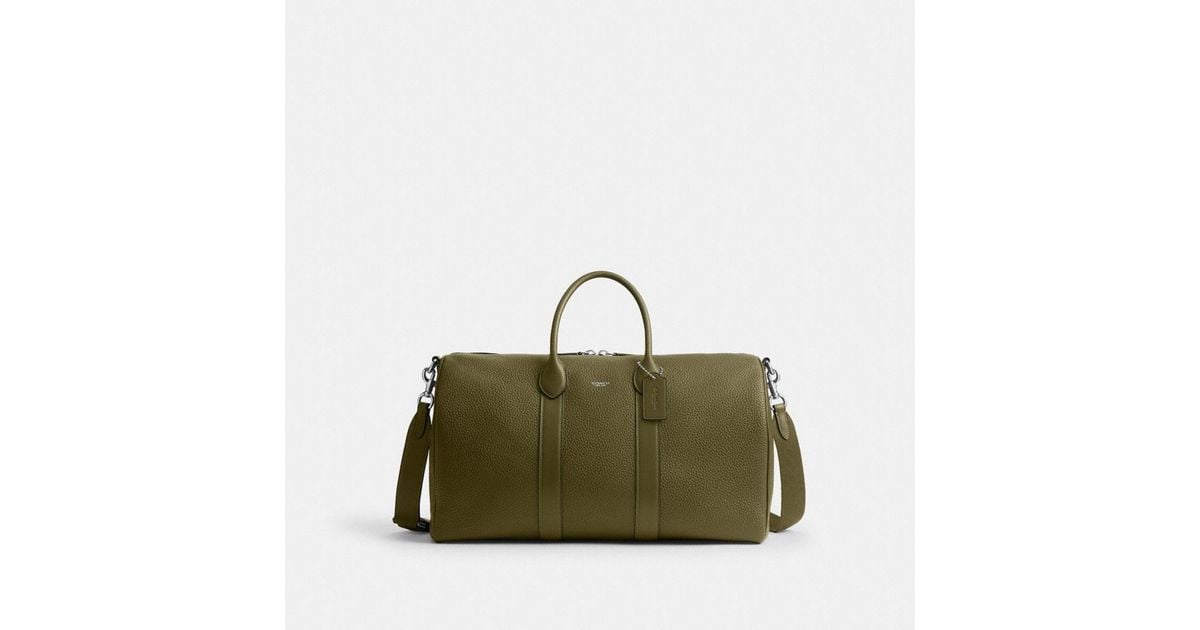 COACH Compass Bag 45 in Green | Lyst